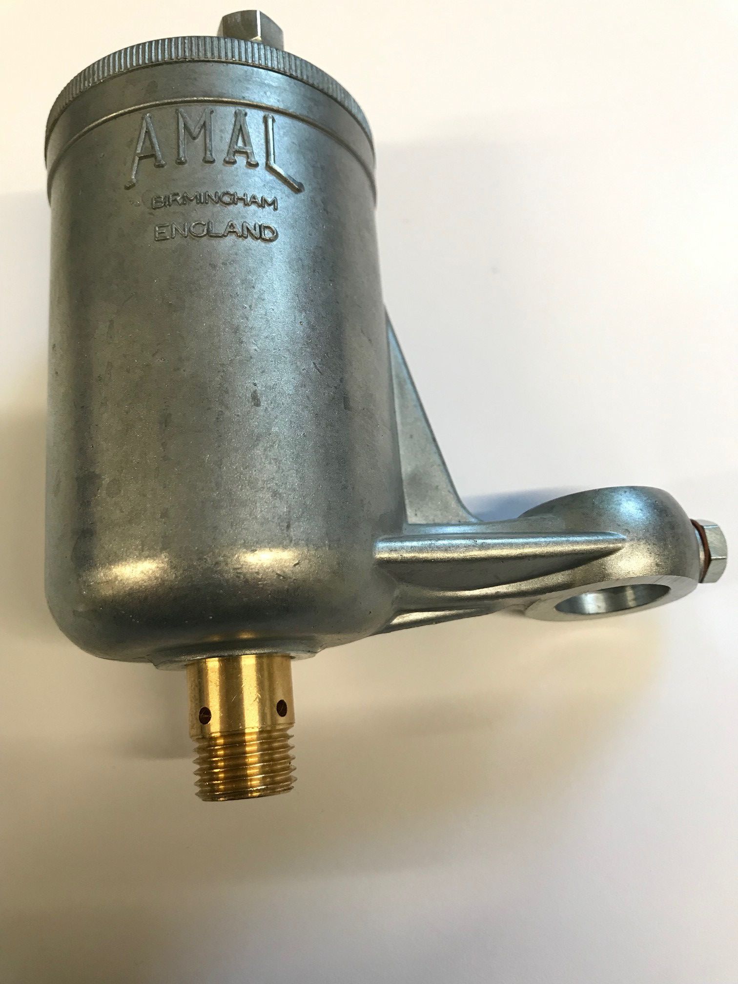 FLOAT BOWL, PRE-MONOBLOC, BOTTOM FEED, BANJO, LEFT FITTING, 7 degree