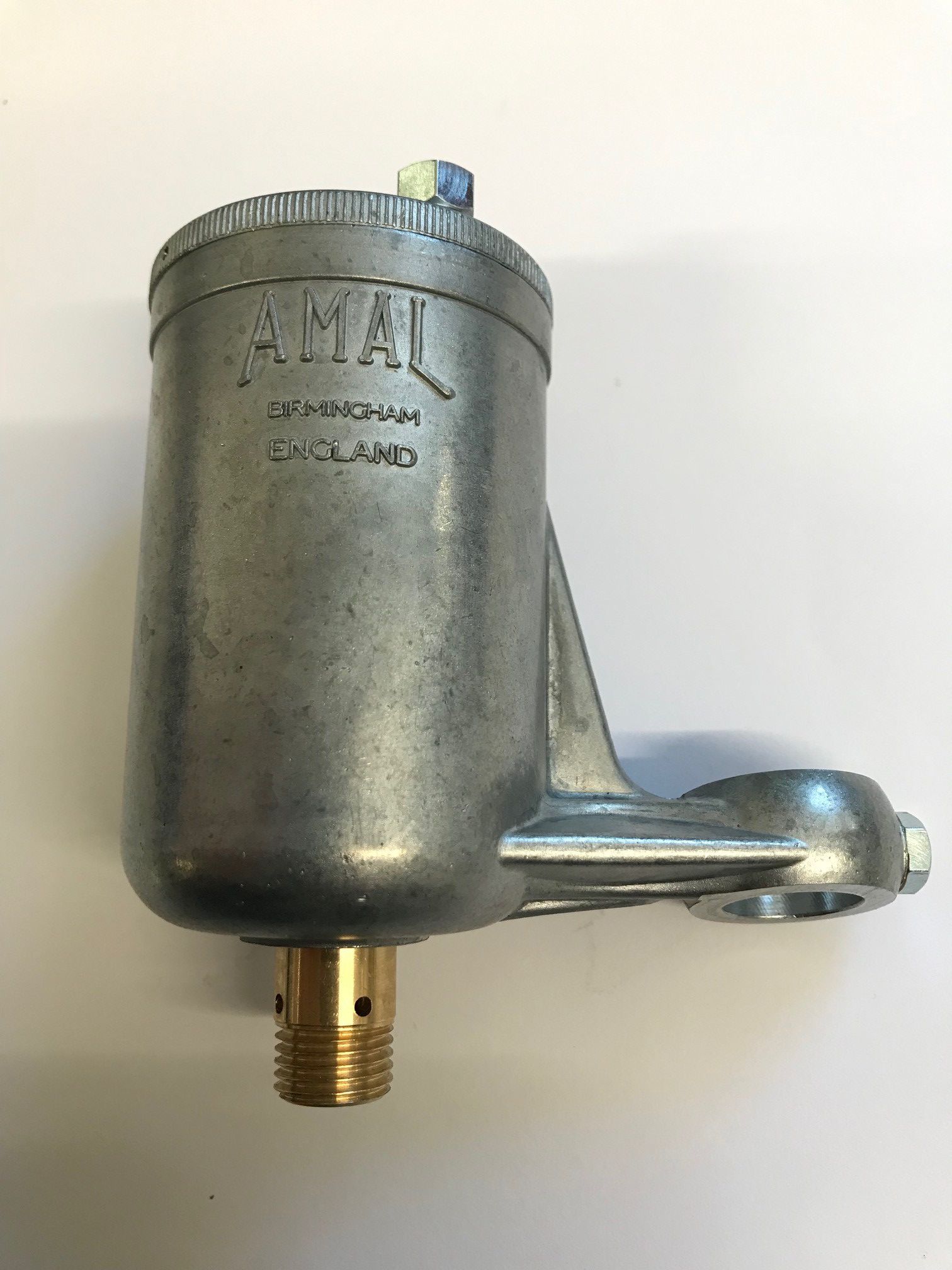 FLOAT BOWL, PRE-MONOBLOC, BOTTOM FEED, BANJO, LEFT FITTING, 15 degree